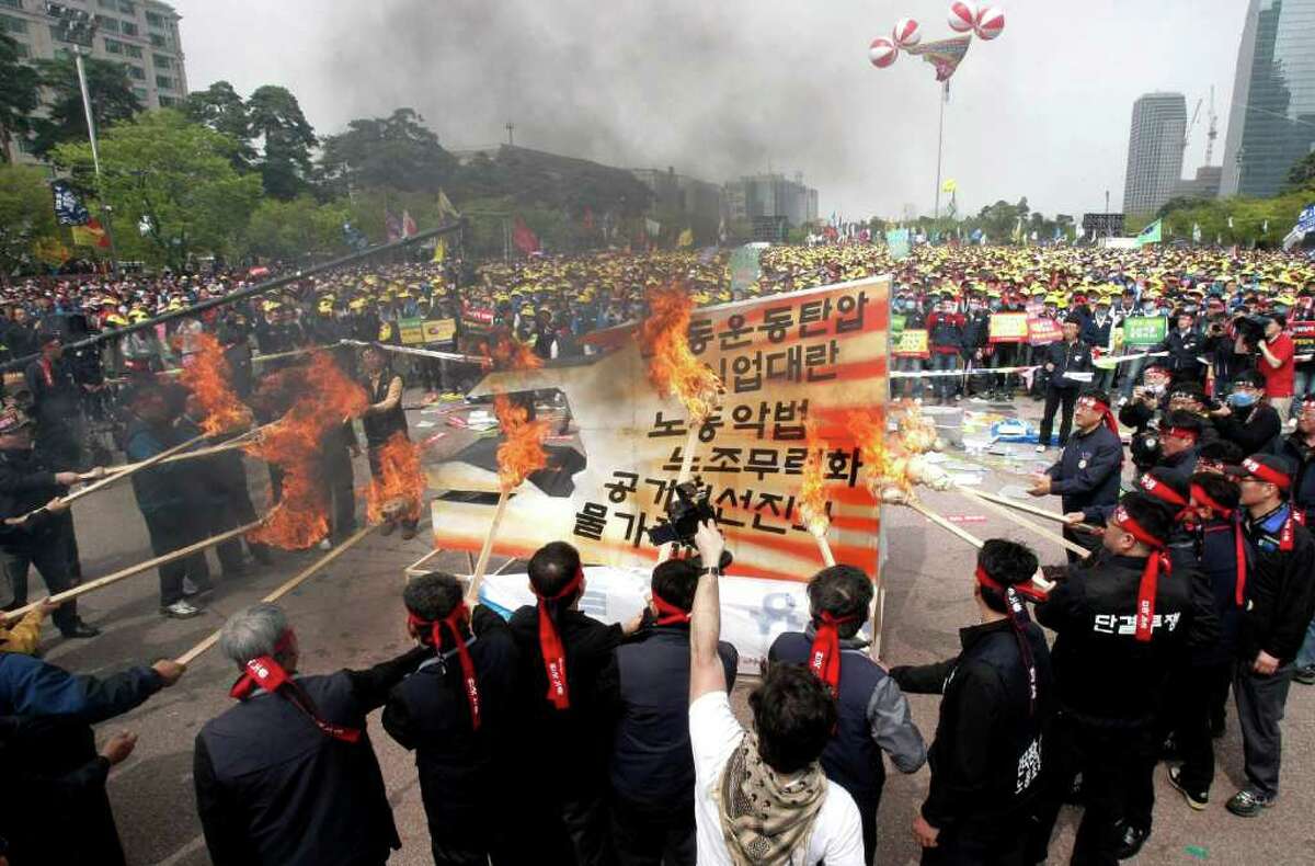 Labor groups demonstrate on May Day