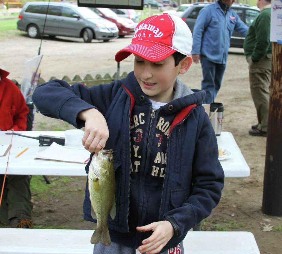 Hook, line and sinker: Greenwich Scouts fall for annual fishing derby
