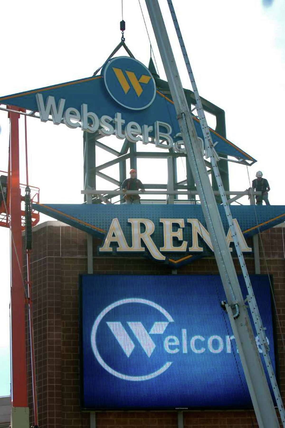 Webster hangs its sign on the Arena