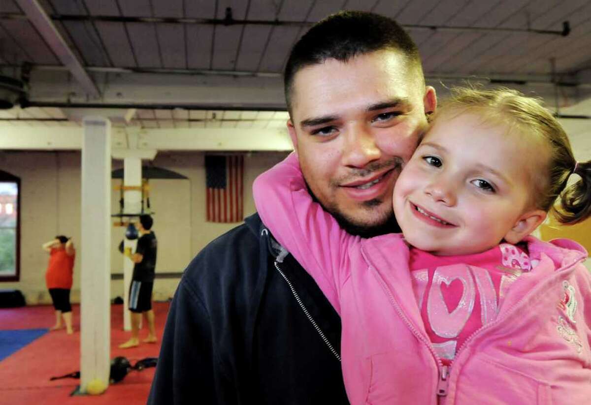 Father, daughter learn to fight