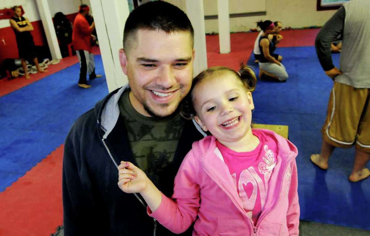 Father, daughter learn to fight