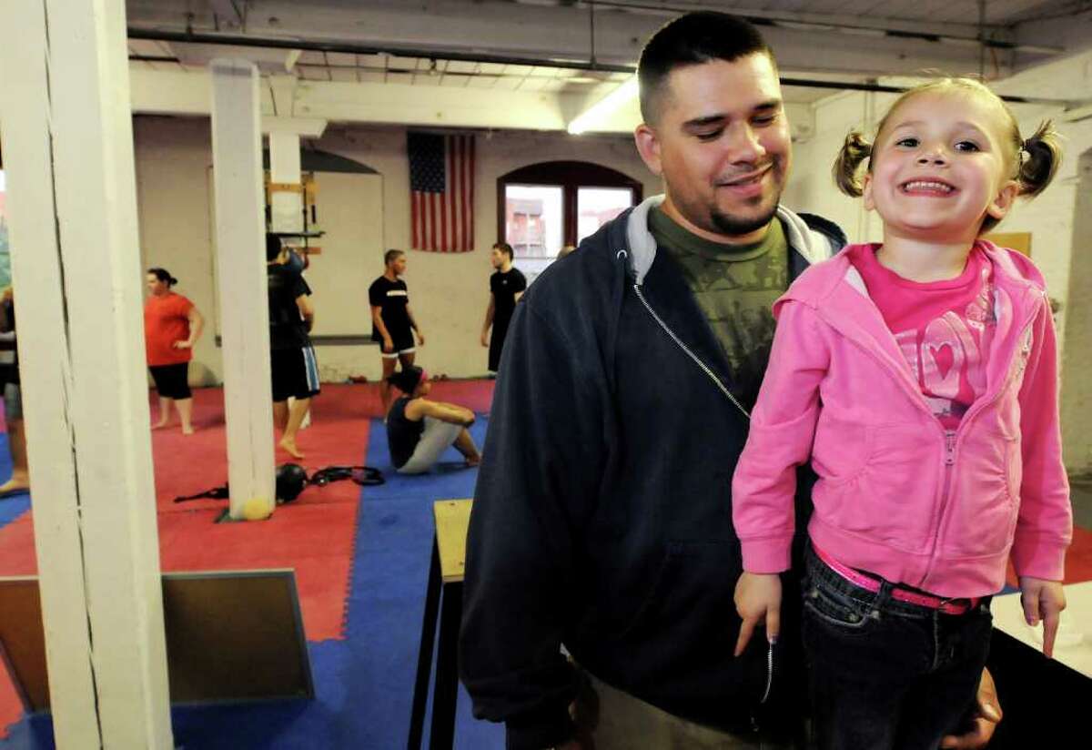 Father, daughter learn to fight