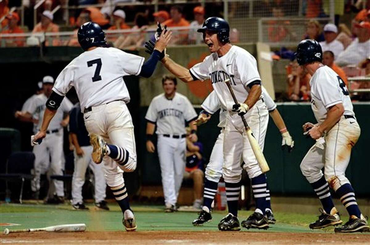 UConn wins twice, stays alive in NCAA Tournament