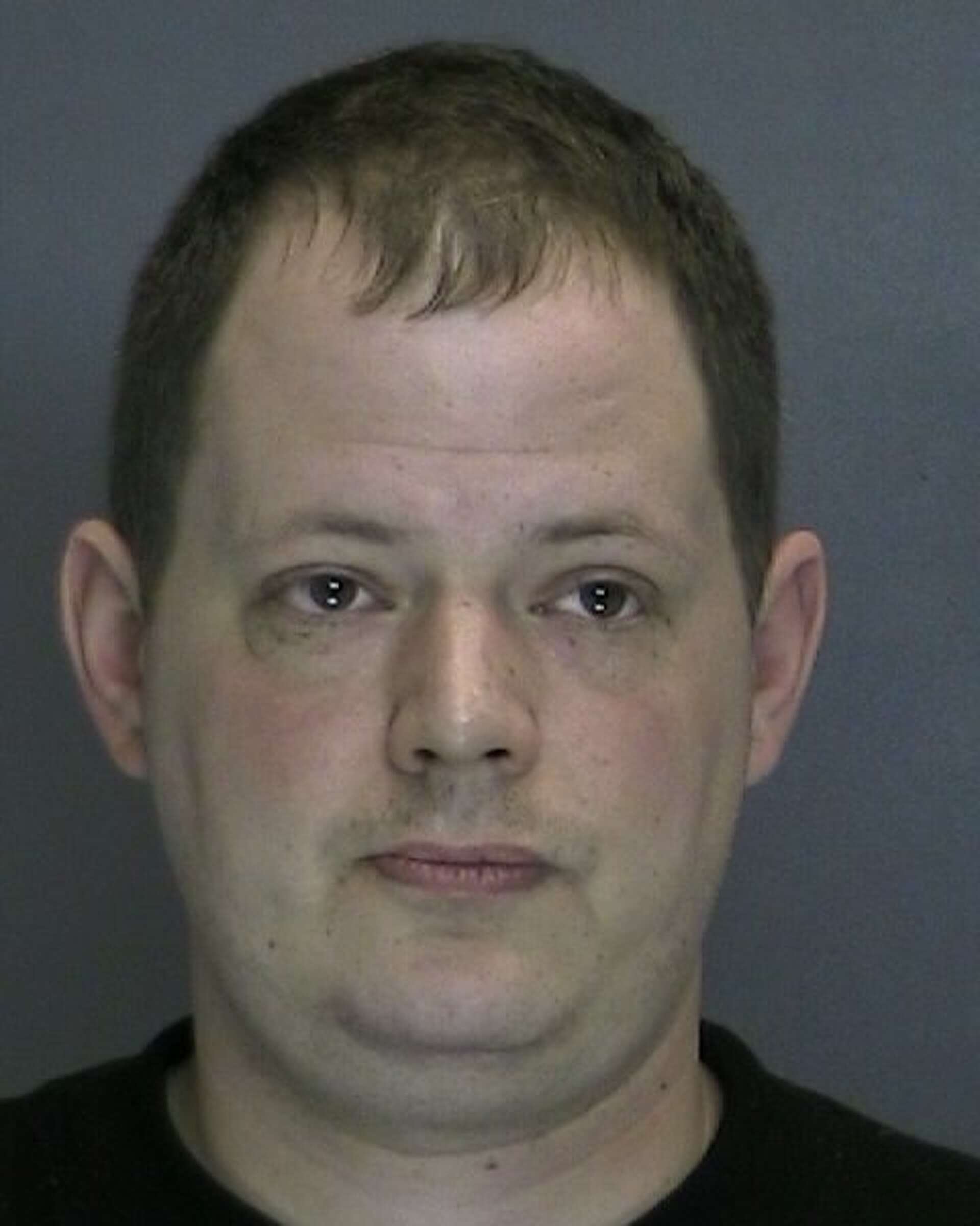 2 arrests in 1994 Troy cold-case murder