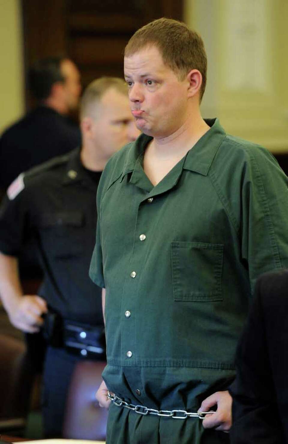 Tensions flare at arraignment in 1994 Troy murder