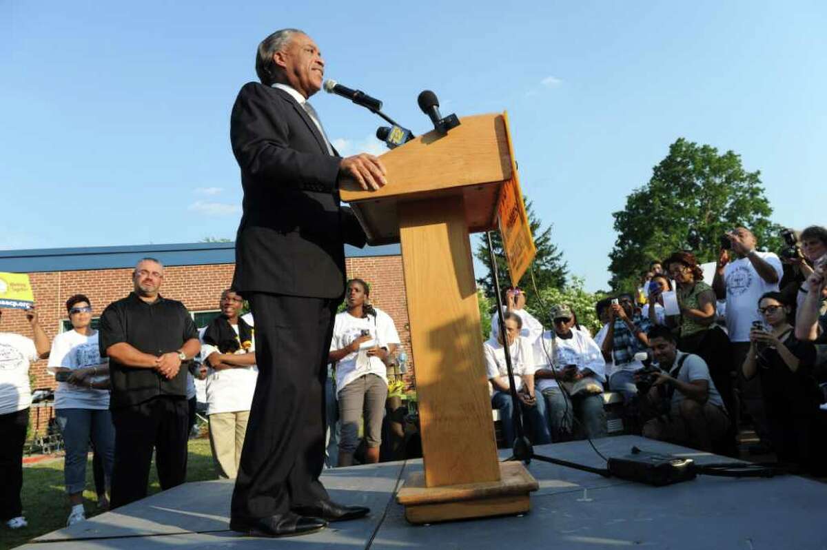 Sharpton defends McDowell at NAACP rally