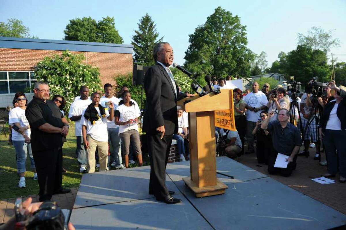 Sharpton defends McDowell at NAACP rally
