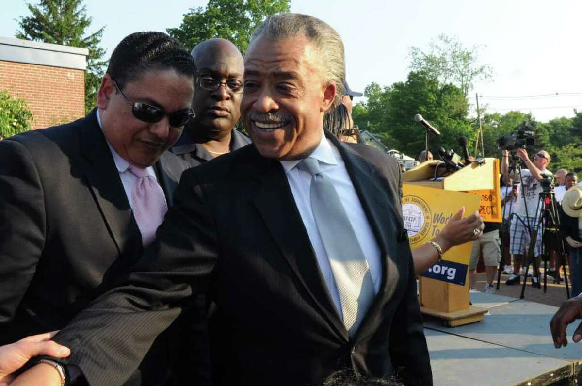 Sharpton defends McDowell at NAACP rally