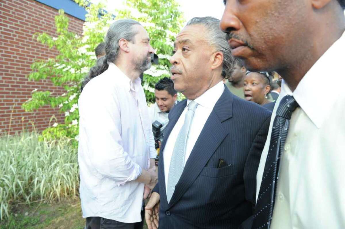 Sharpton defends McDowell at NAACP rally