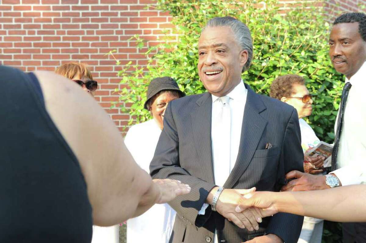 Sharpton defends McDowell at NAACP rally