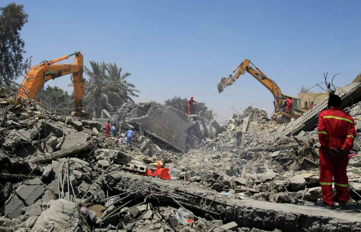 Libya says NATO airstrike kills 15 west of capital