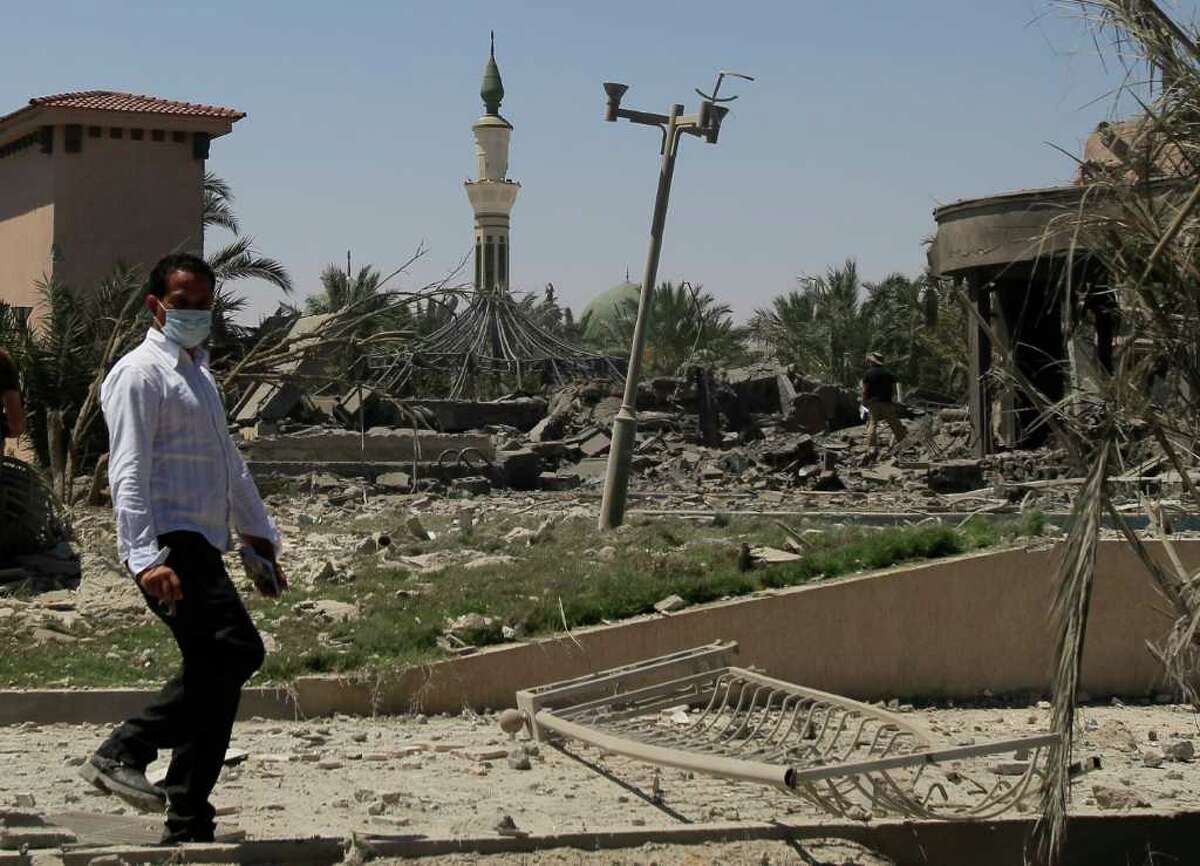 Libya says NATO airstrike kills 15 west of capital