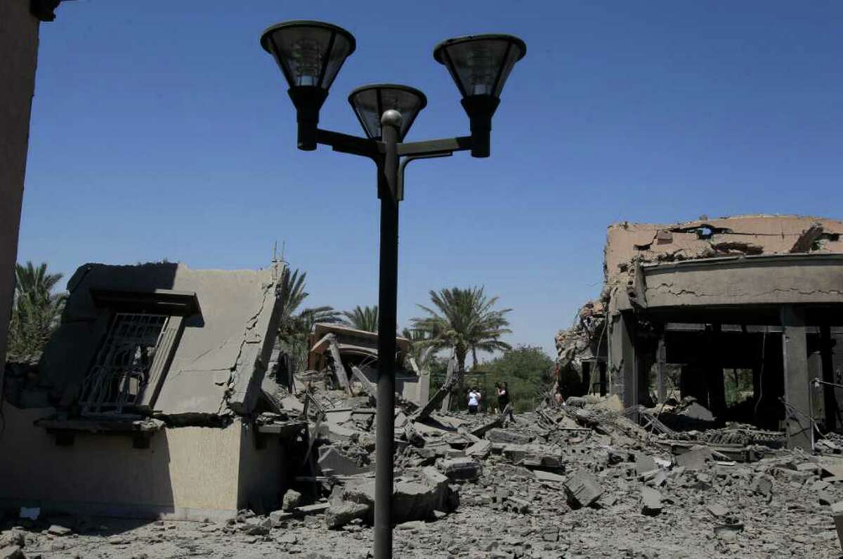 Libya says NATO airstrike kills 15 west of capital