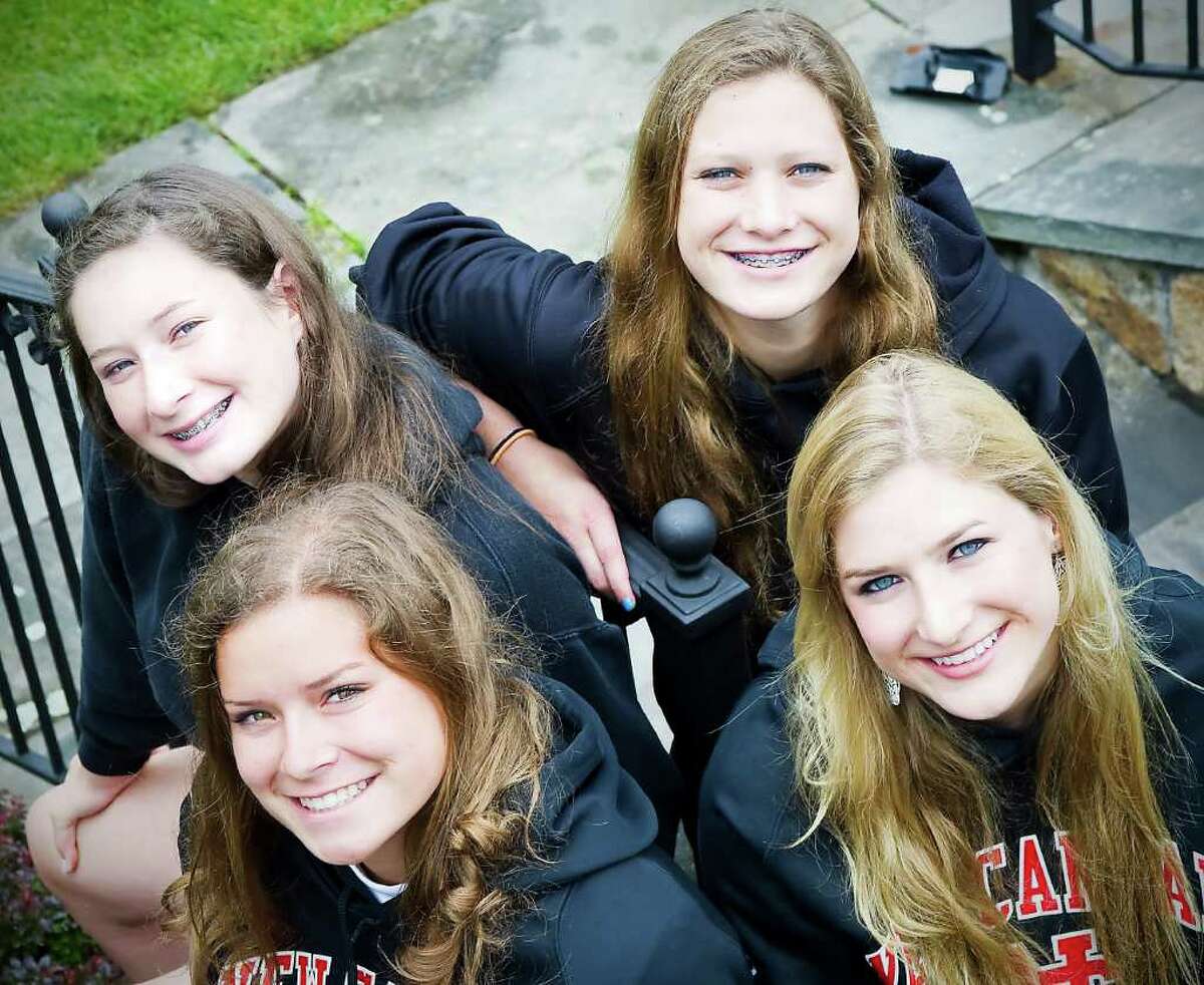 New Canaan's Rusch sisters rule the pool