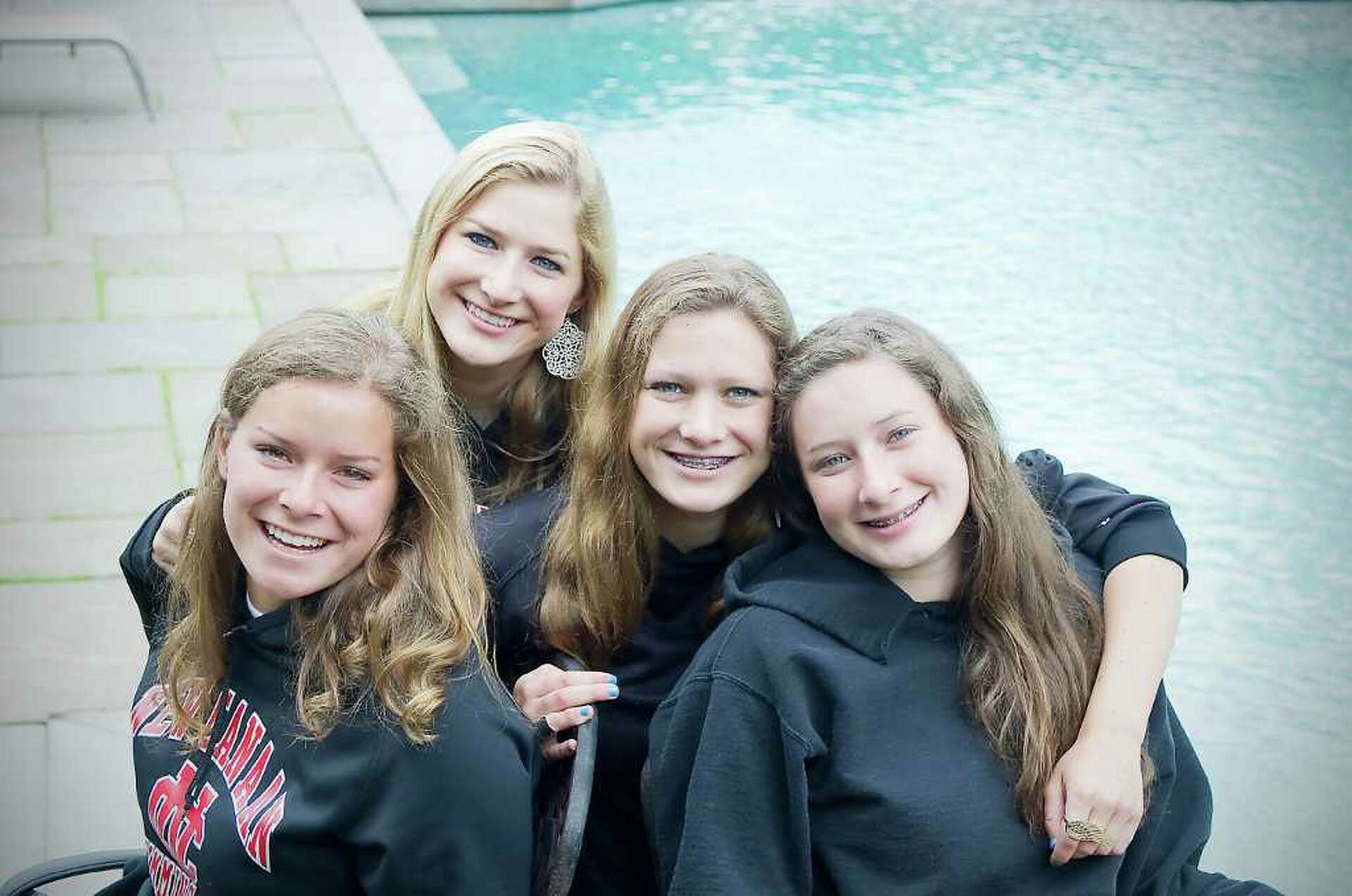 New Canaan's Rusch sisters rule the pool