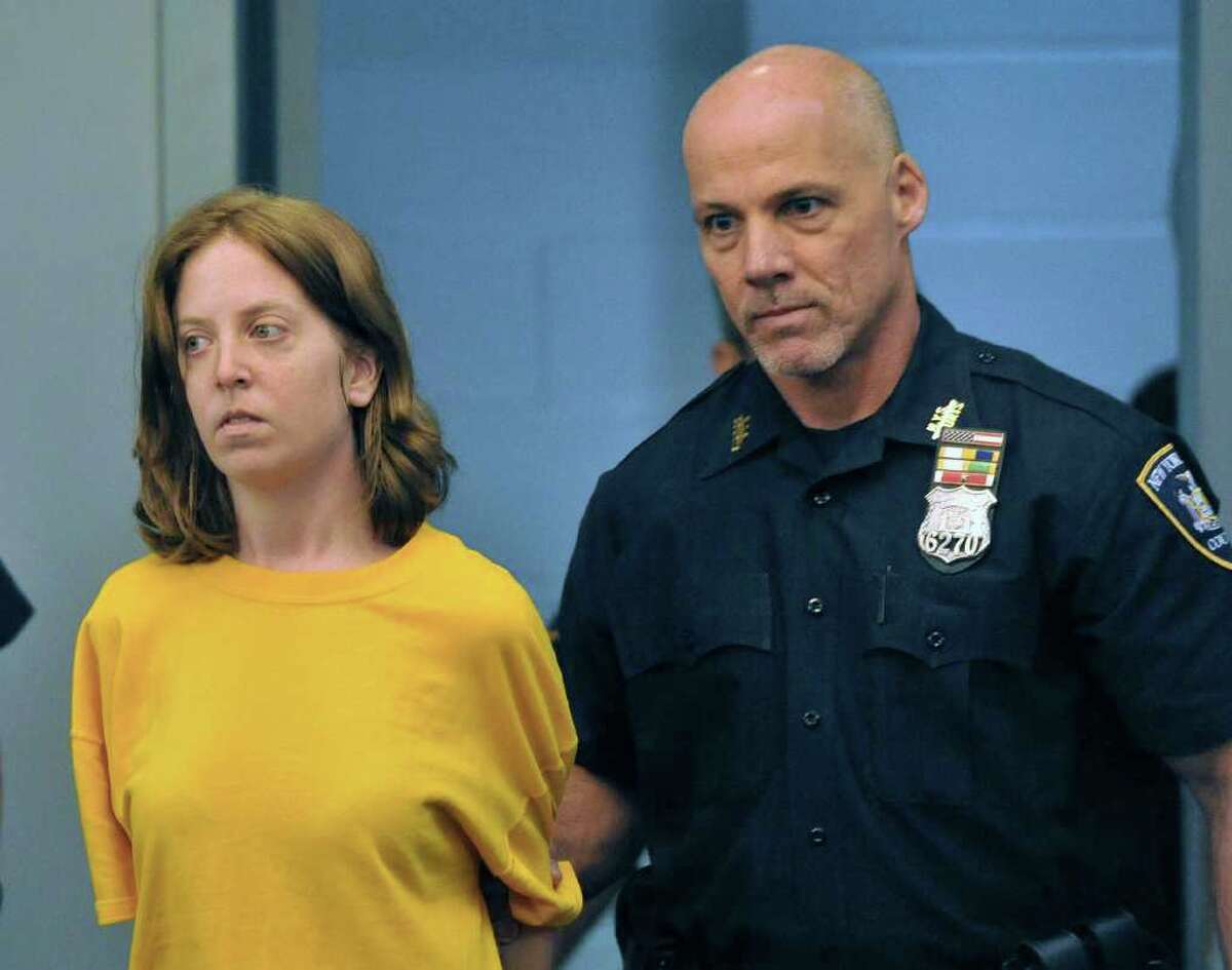 Charged wife: No murder plan in holdup