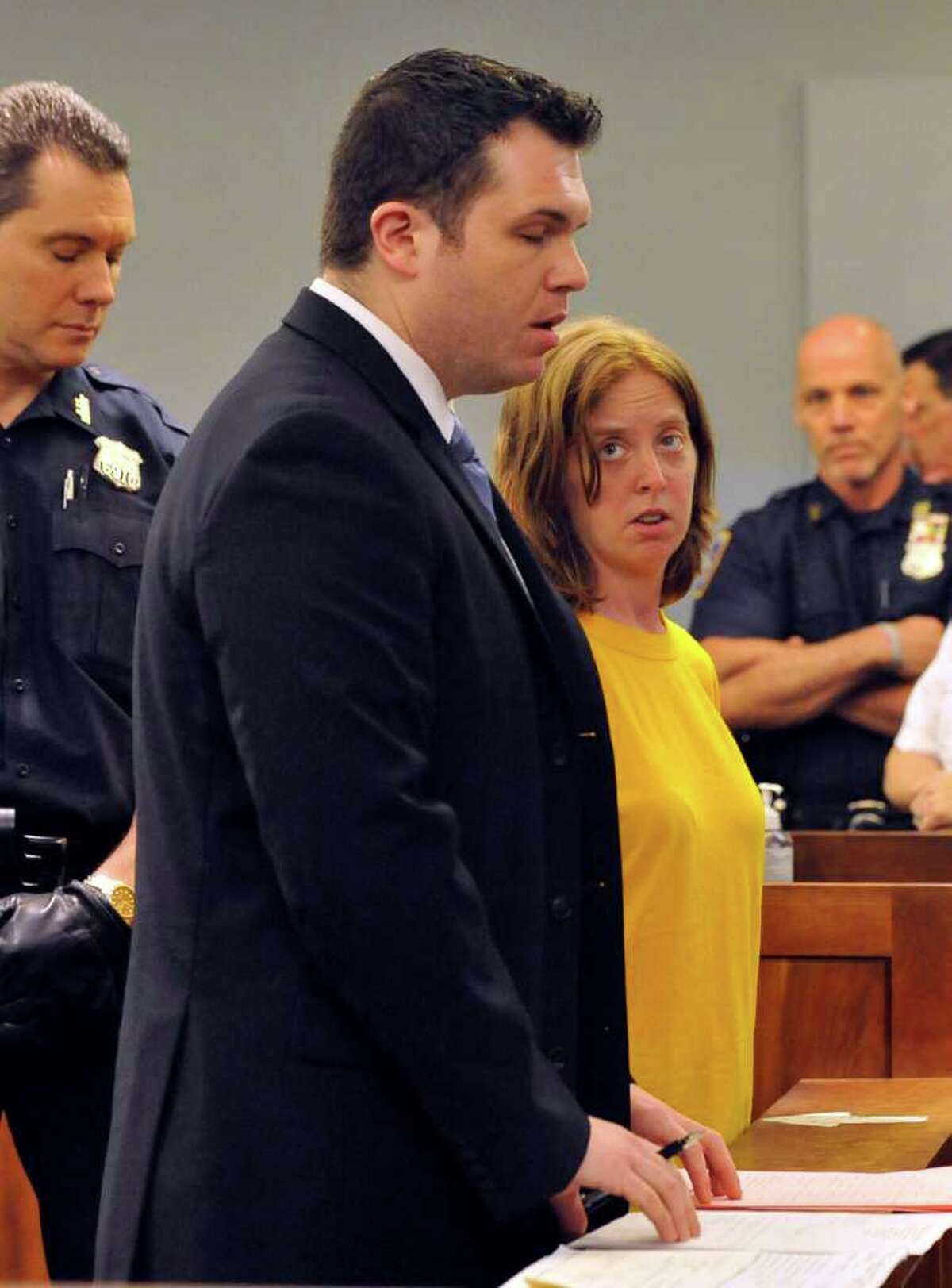 Charged wife: No murder plan in holdup