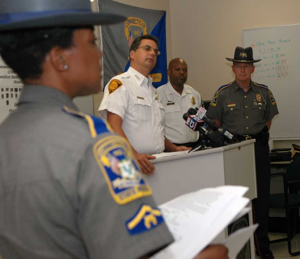 Police arrest 29, seize drugs and guns in early-morning sweep