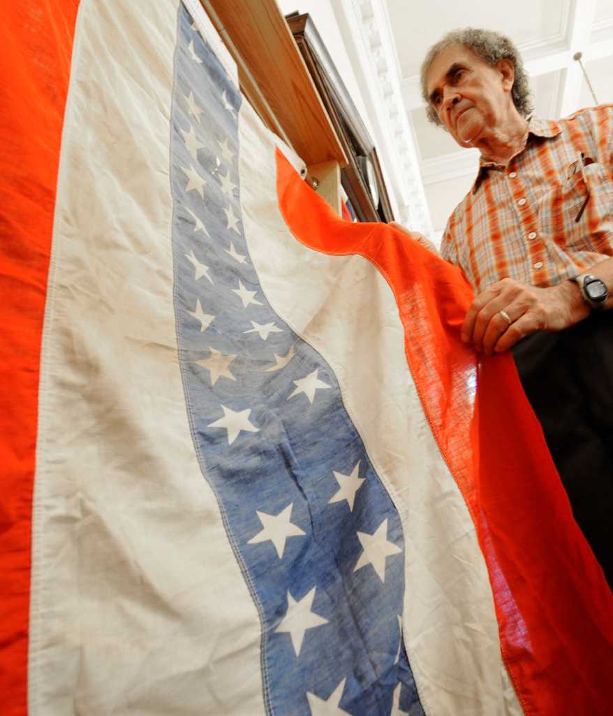 Flags rising 10 years later