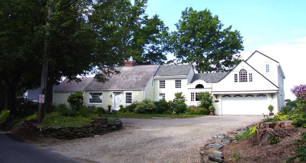 Waterfront colonial features views, magnificent grounds