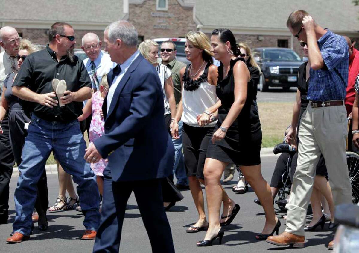 Hundreds attend funeral for Texas Rangers fan