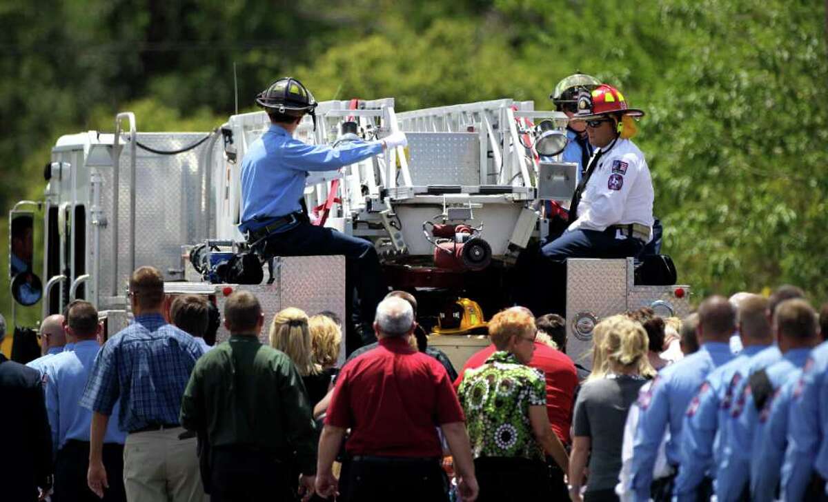 Hundreds attend funeral for Texas Rangers fan