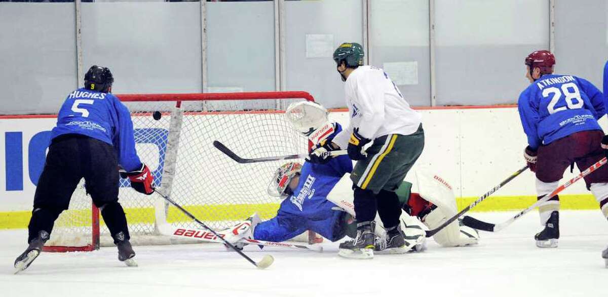 Area hockey luminaries turn out for Harrington-Howes fund-raiser