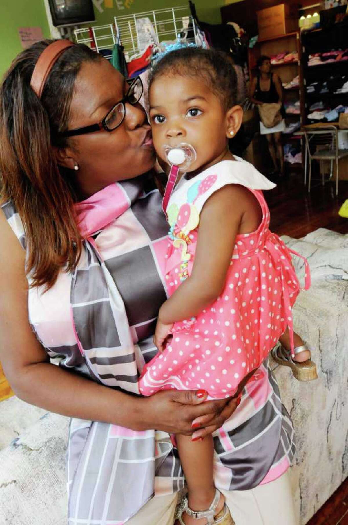 Ministry serves the community through prayer and a store where ...