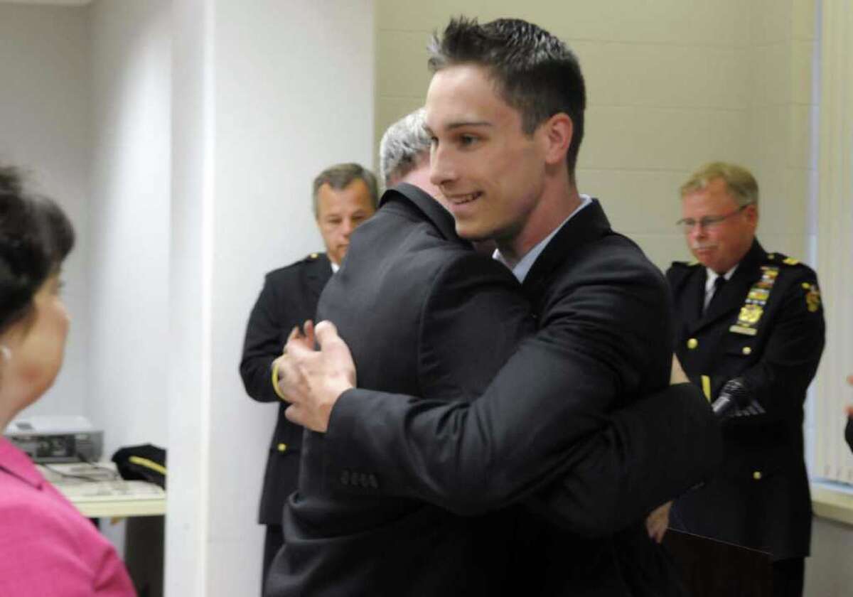 Troy swears in four new officers