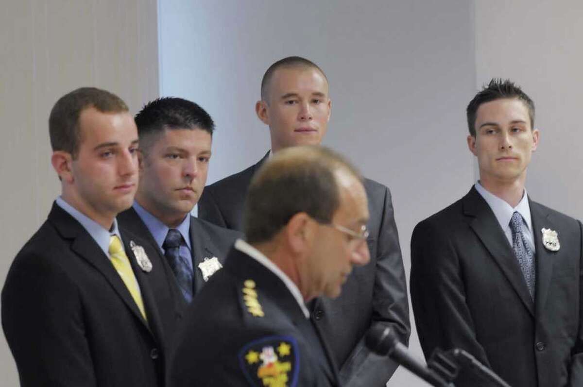 Troy swears in four new officers