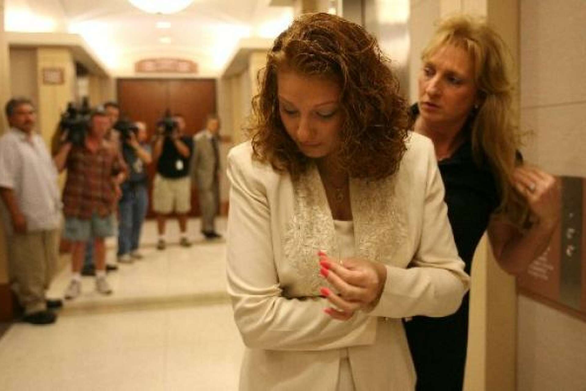 Freed from prison, young mom's shackled by uncertainty