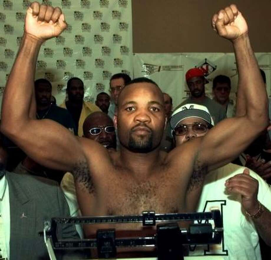 Boxer Johnson named in 2nd Red Cross theft scheme - Houston Chronicle