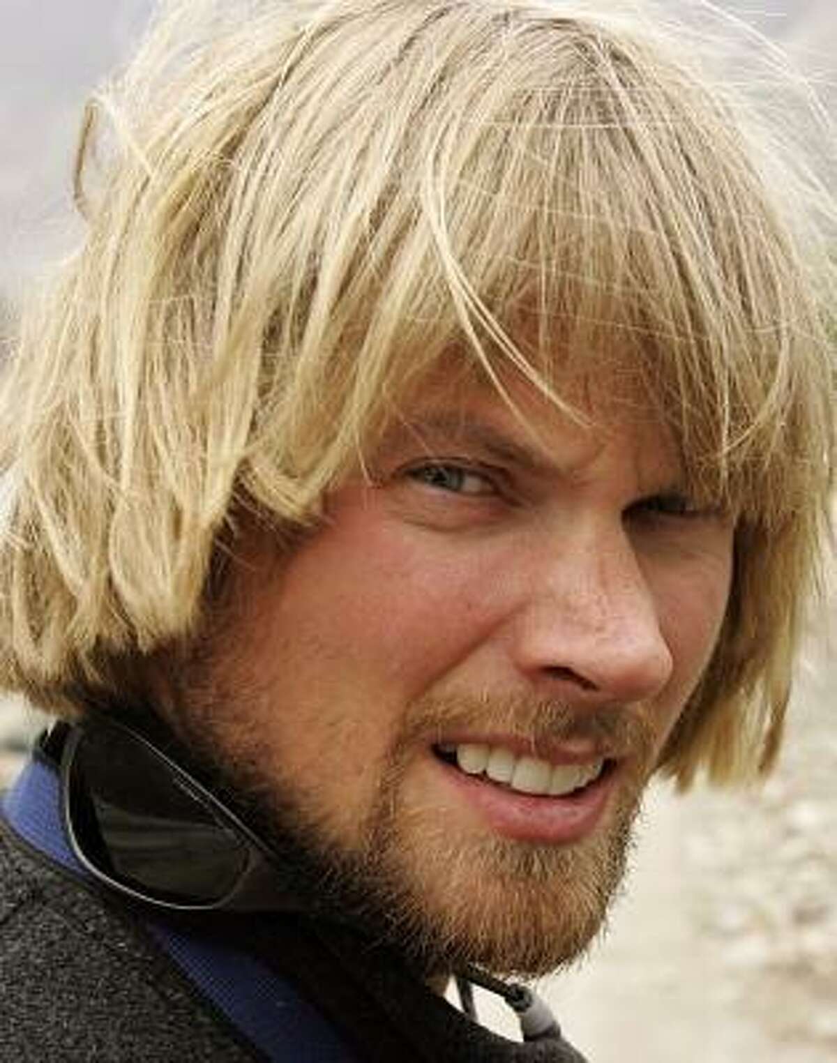 2 rescued from mountain where 11 feared dead