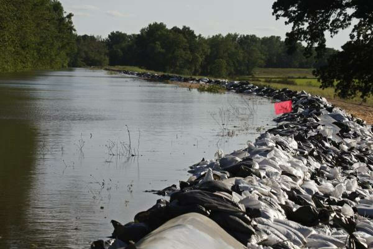 Mississippi River breaks through Illinois levee