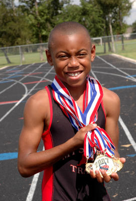 Faces in the crowd: 8-year-old track star turns heads