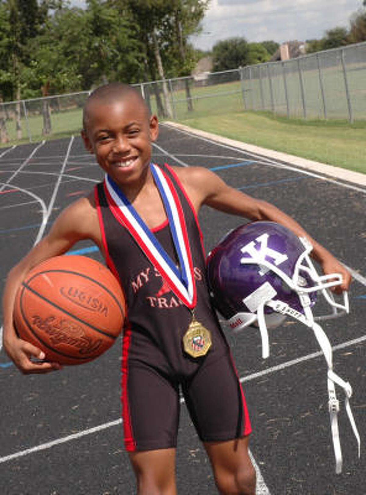 Faces in the crowd: 8-year-old track star turns heads