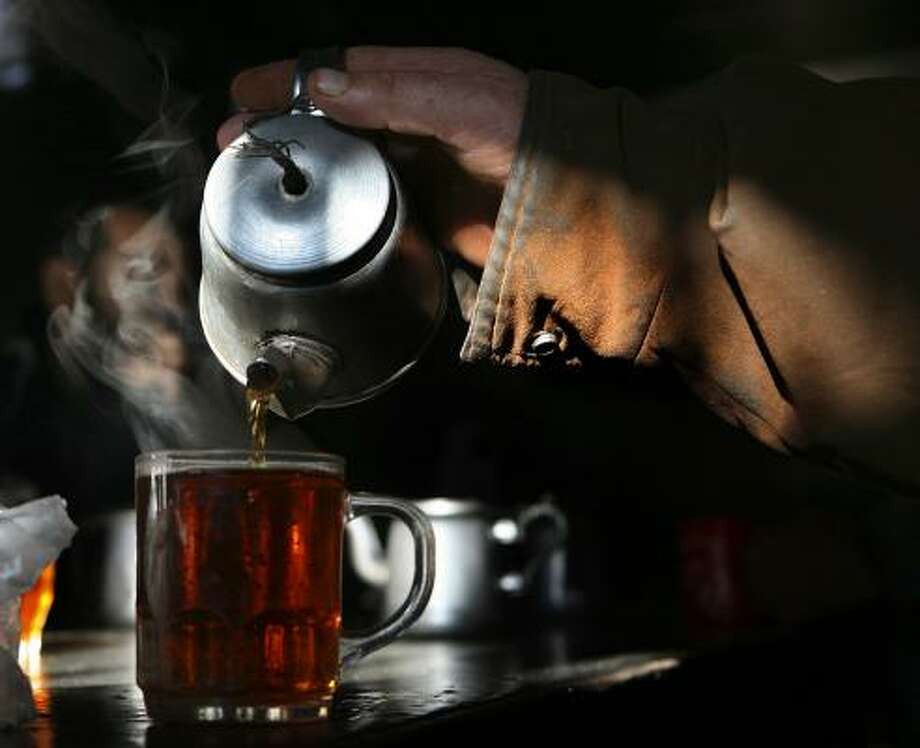 Amid upheaval, tradition endures at Kabul tea shops - Houston Chronicle