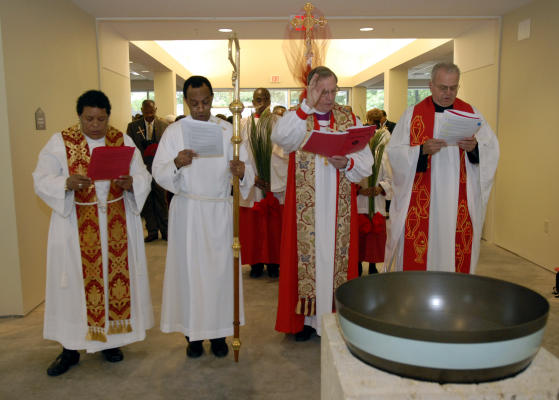 Church rebuilt after three-year wait (w/photos)