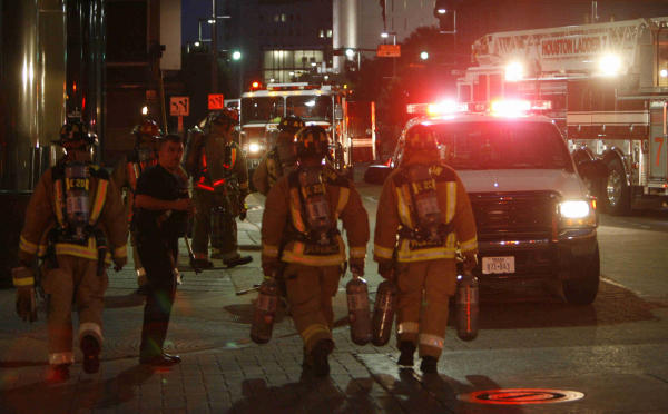 Four floors closed after downtown high-rise fire