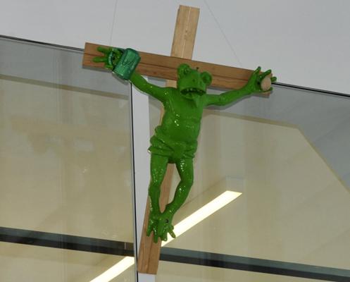 Despite pope's anger, crucified frog stays put