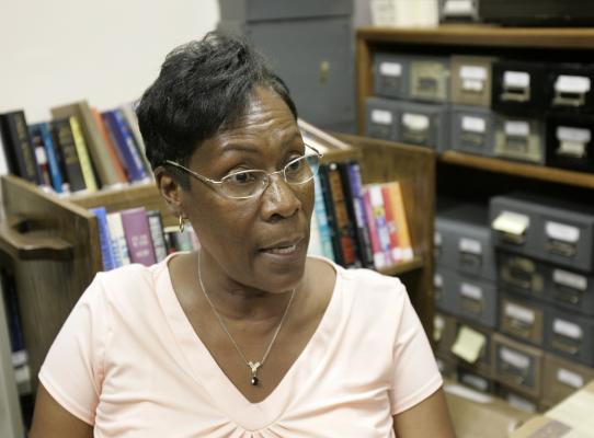 Librarian helps inmates understand a changed world