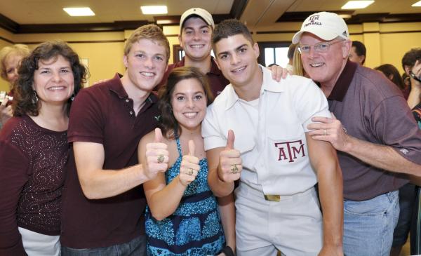 Another Aggie first: Quadruple graduation