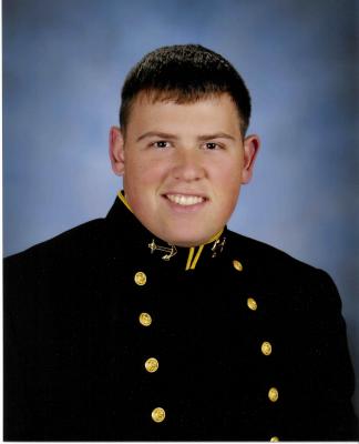 Resident graduates U.S. Naval Academy