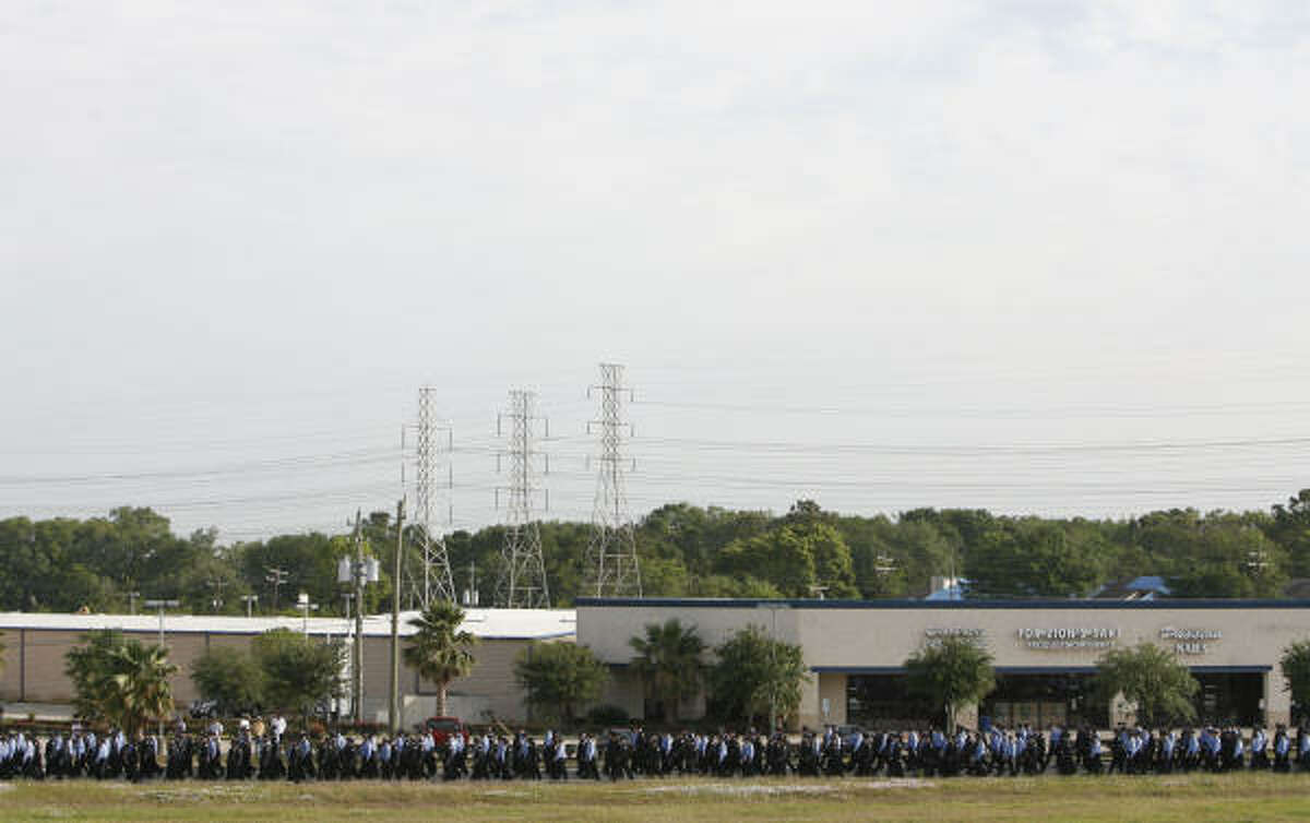 HFD marches to salute 2 comrades who died at fire