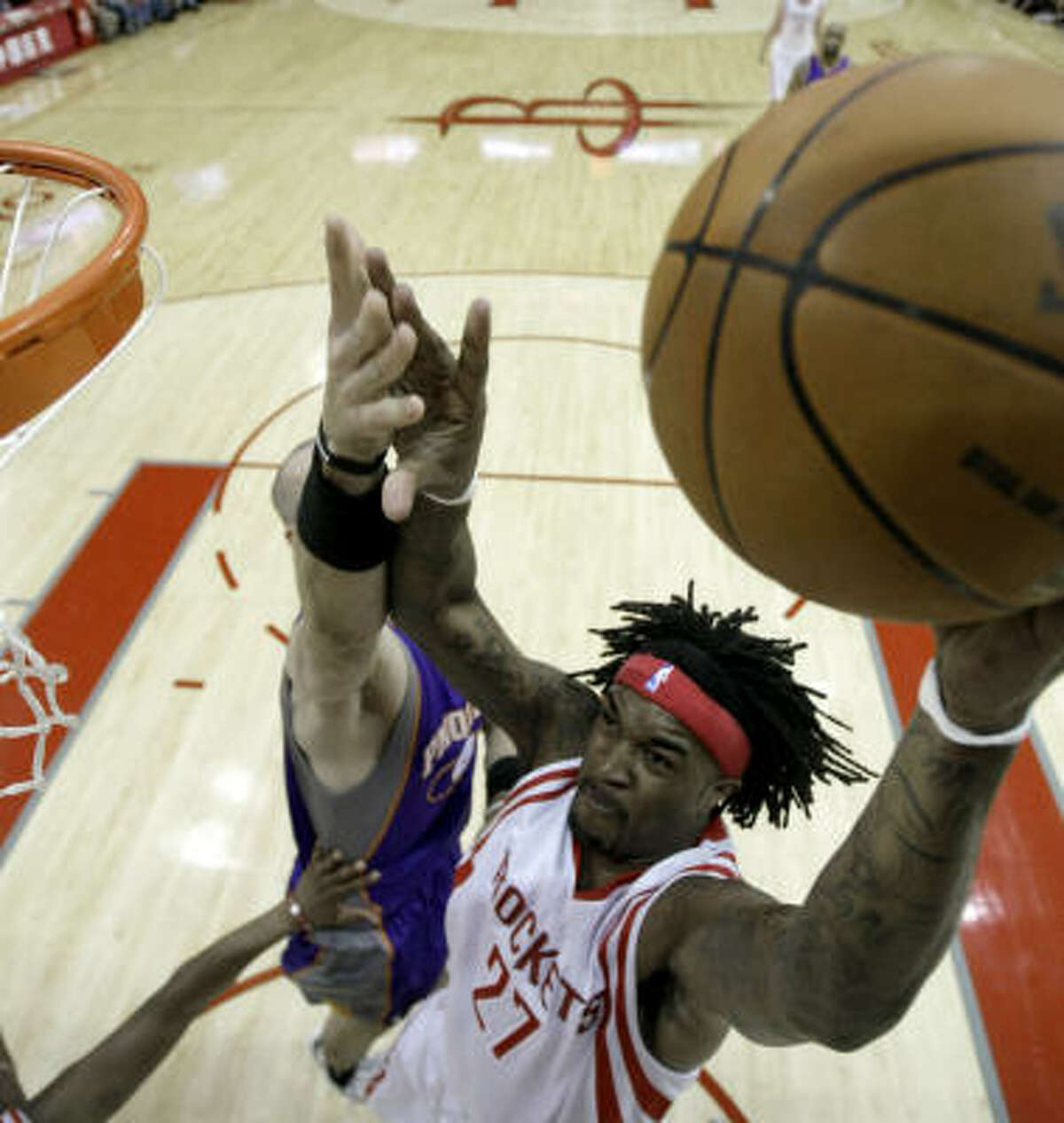 Rockets centers Hill, Thabeet don't mind team trying to replace them