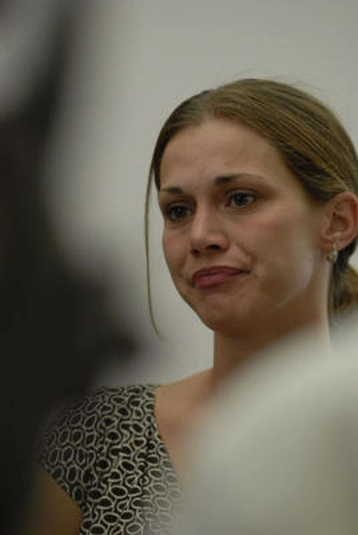 Ex-cheerleader charged in baby son's mutilation
