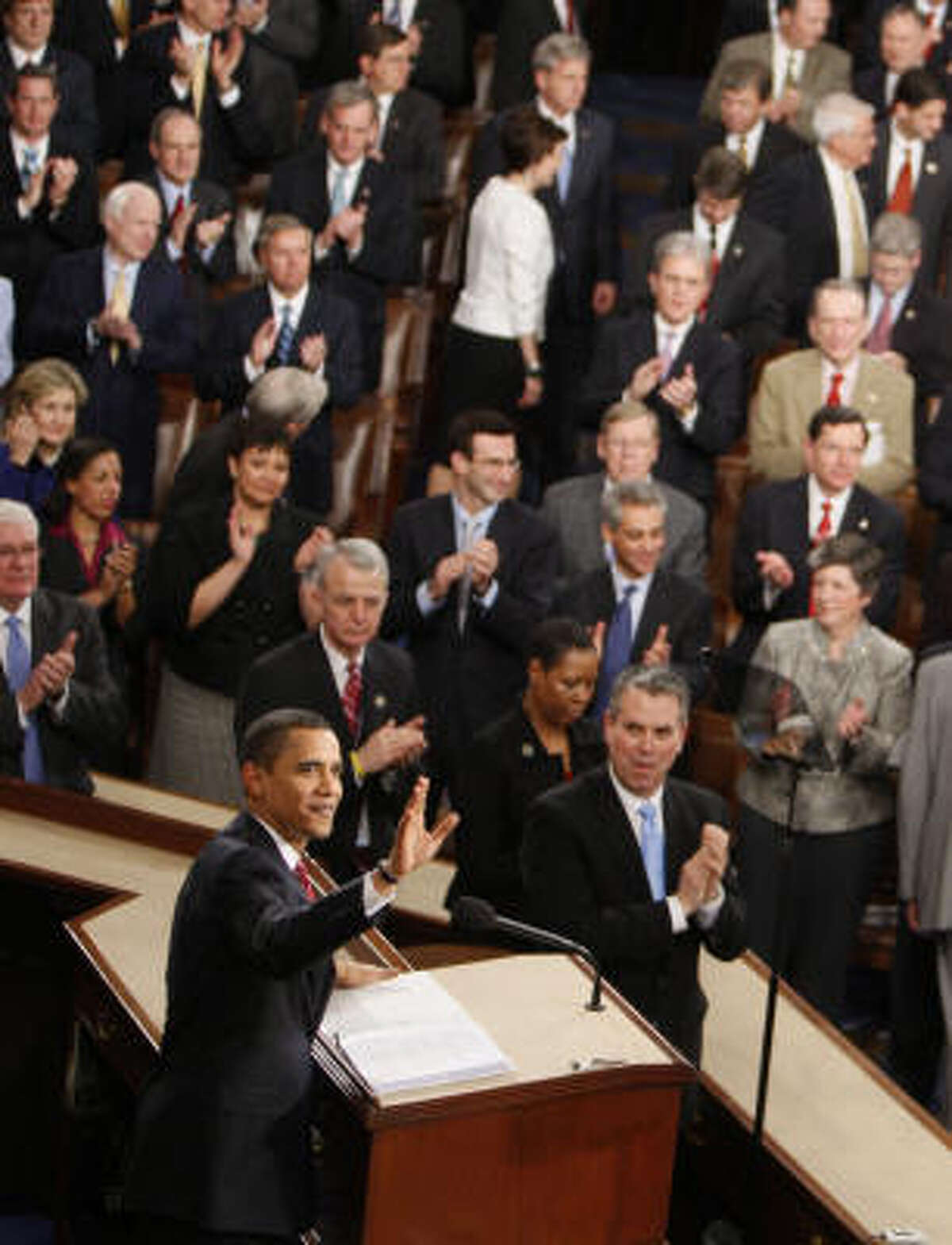 'We will rebuild,' Obama promises struggling nation