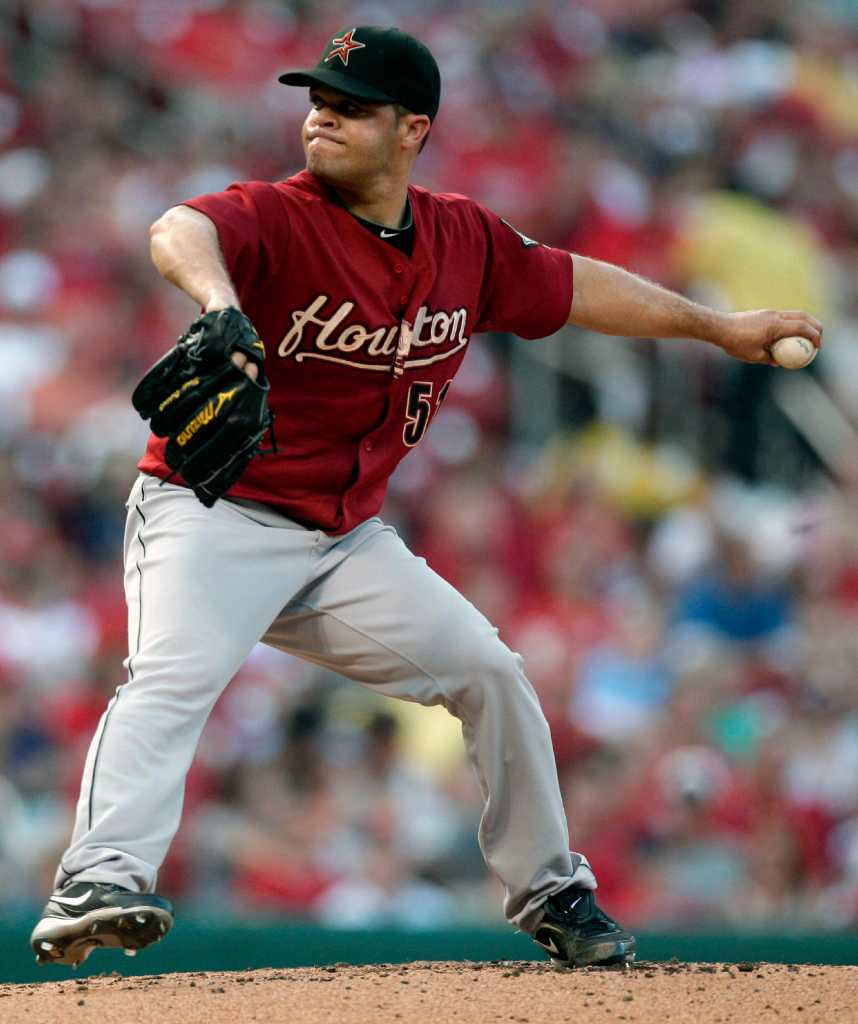 Astros ace leads way past Cardinals