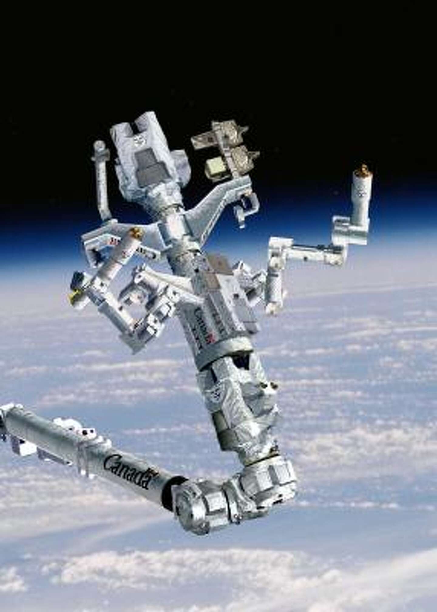 Second spacewalk bringing 'Mr. Roboto' to life