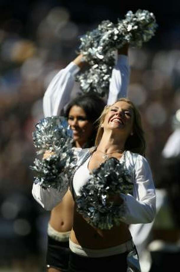 Raiders cheerleader sues, says pay is less than $5 an hour - SFGate